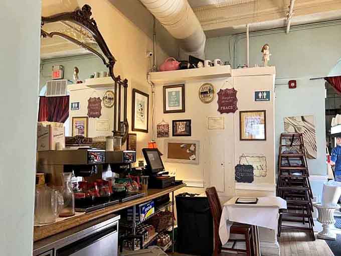 The interior extends beyond the main room, offering more cozy spots to enjoy your French-inspired feast.