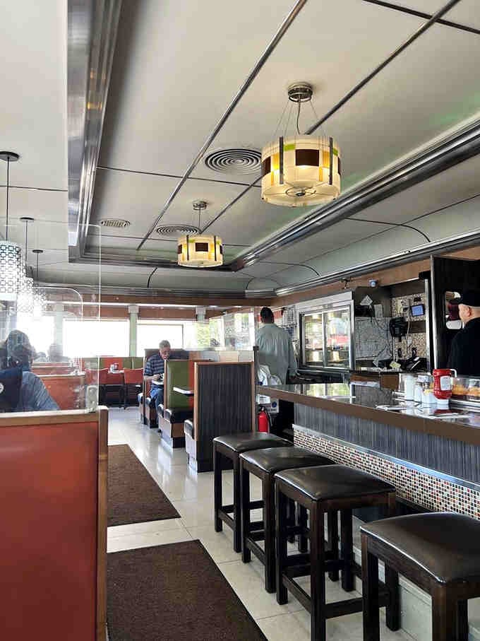 Clean lines, comfortable seating, and that classic diner counter where solo breakfast eaters feel perfectly at home.
