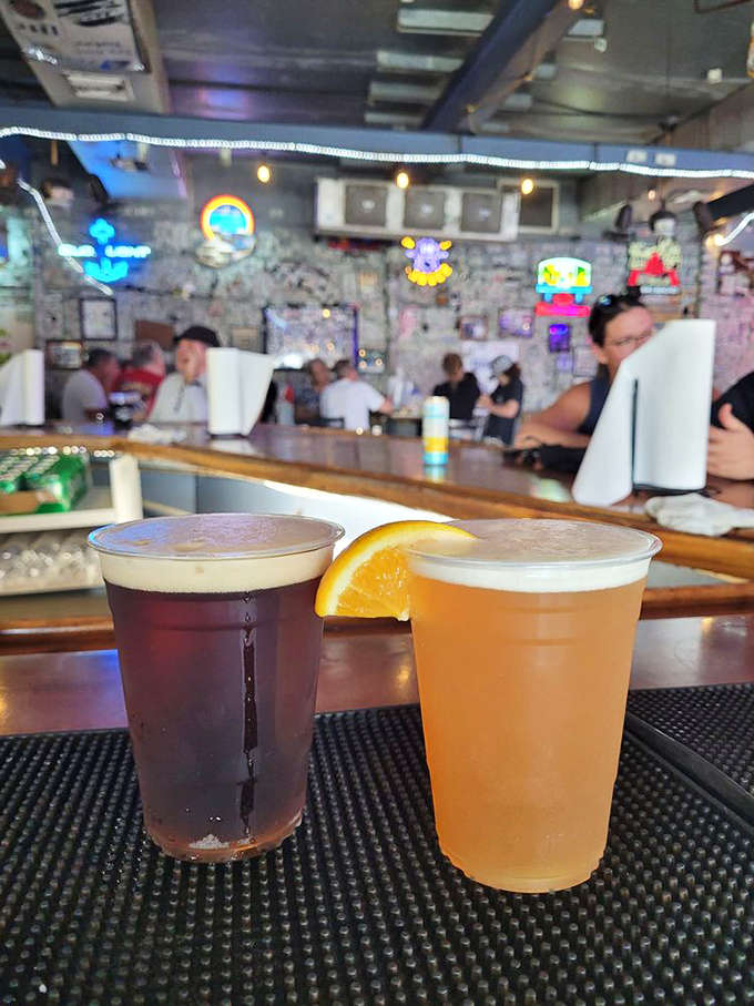 Cold beer with an orange slice because even simple drinks get the Florida treatment at this waterside gem.