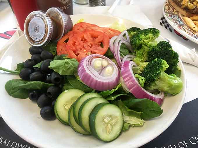 Even the garden salad arrives on a plate big enough to feed multitudes at The Gem Diner.