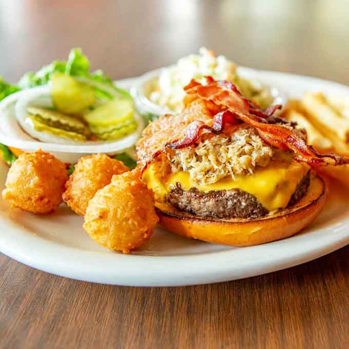 That bacon cheeseburger topped with a crab cake is basically surf and turf's overachieving younger sibling winning.