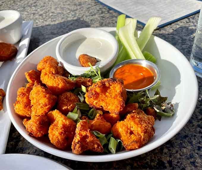 The Blazing Cauliflower proves vegetables can be exciting when they're dressed up in buffalo sauce and attitude.