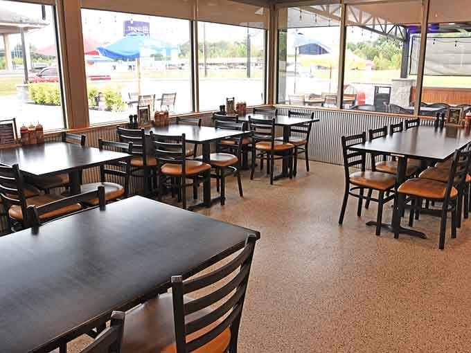 Spacious dining room with windows that let in natural light and views of your next barbecue pilgrimage.