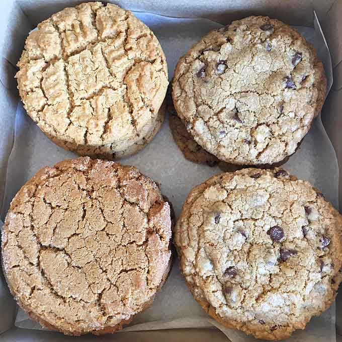 Four giant cookies that could double as frisbees, if you weren't planning to devour them immediately.