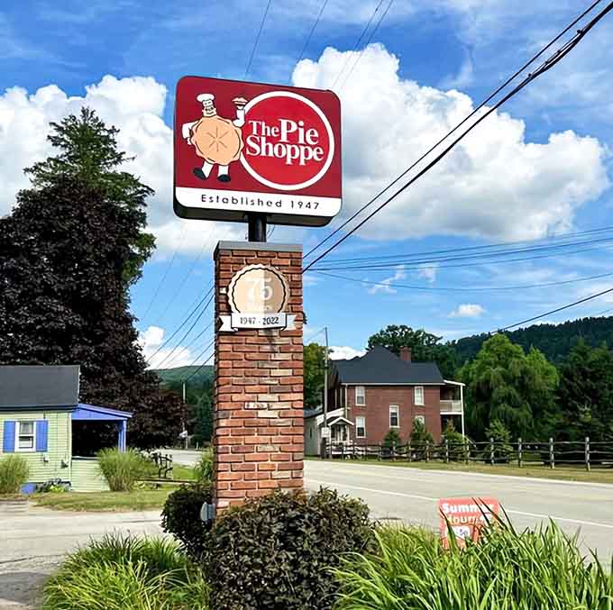 That vintage sign stands proud like a beacon guiding hungry travelers to their delicious destiny since way back when.