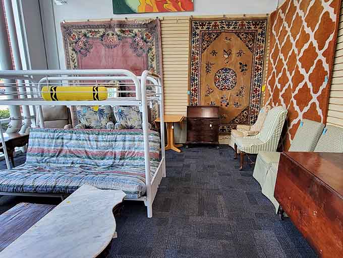 Bunk beds, oriental rugs, and vintage trunks create an eclectic furniture showroom that changes weekly.