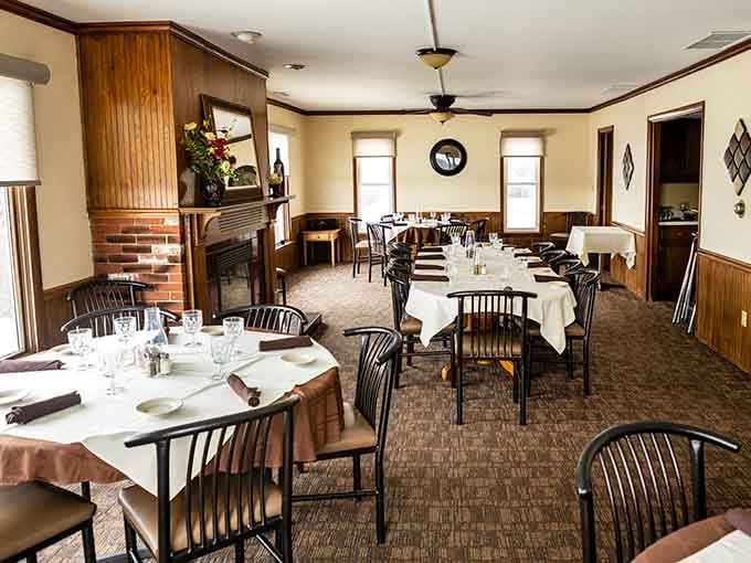 Wood paneling and white tablecloths create an atmosphere that whispers "relax, we've got all the time in the world."
