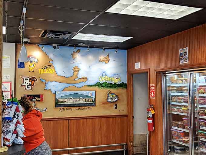 A colorful mural celebrates local landmarks, adding regional charm to your ice cream experience without being too touristy.