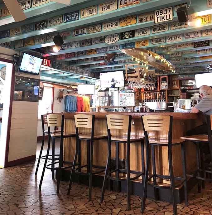 A bar lined with license plates from every corner of America &ndash; democracy in decorative form, really.