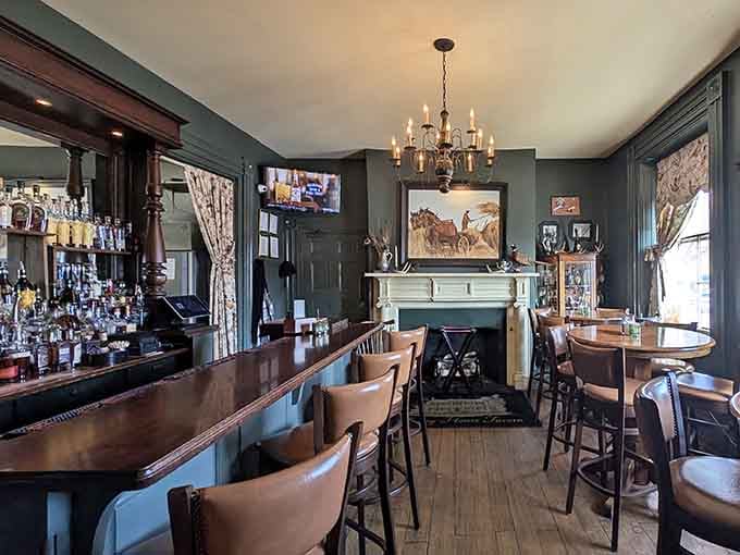 A bar area where bourbon flows and conversation happens, complete with vintage advertisements and Kentucky charm.