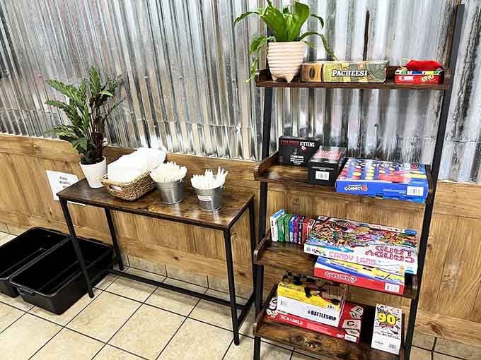 Board games stacked and ready because good food tastes even better when paired with friendly competition and laughter.