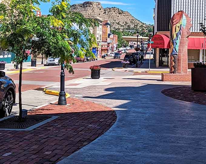 Downtown streets curve gently past historic buildings, inviting leisurely strolls instead of frantic rushing from place to place.