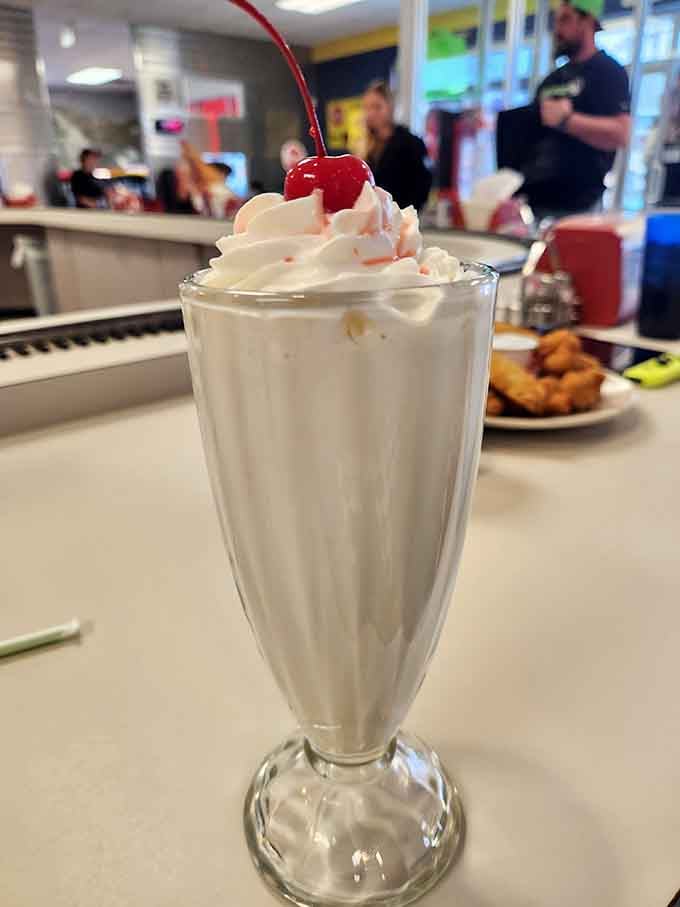 A classic milkshake crowned with whipped cream and a cherry transports you straight to 1955.