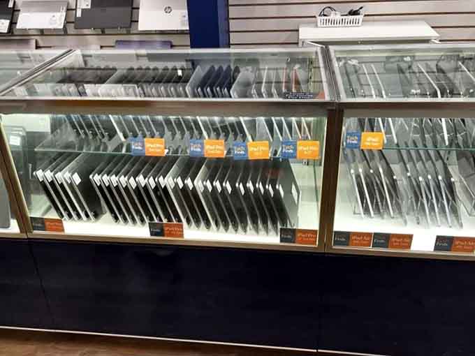 Rows of tablets offer tech bargains that'll make you wonder how anyone forgets these expensive gadgets in their luggage.