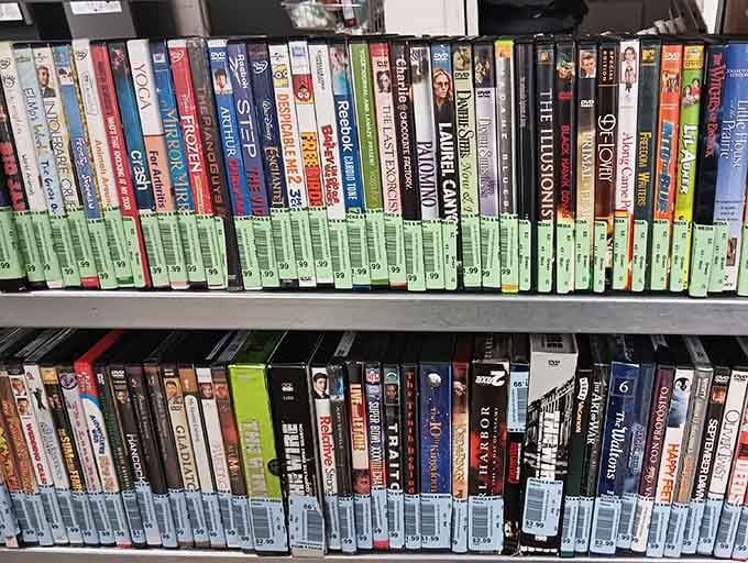 DVDs and movies line the shelves like a Blockbuster that never closed its doors to nostalgia.