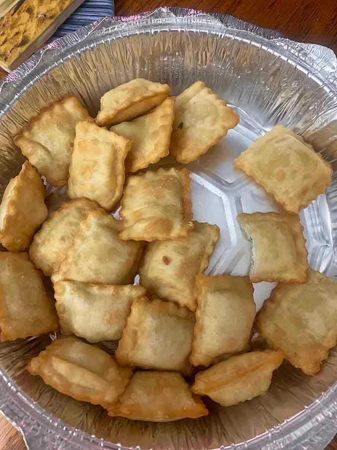 Golden fried ravioli pillows that disappear faster than you can say "pass the marinara."