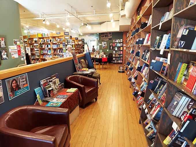 Village Books and Paper Dreams armchairs with fiction shelves create the perfect spot for testing your next read.