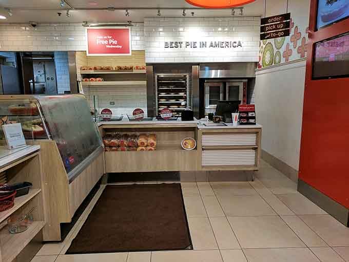 The pie counter beckons like a siren song, displaying whole pies ready to go home with you tonight.