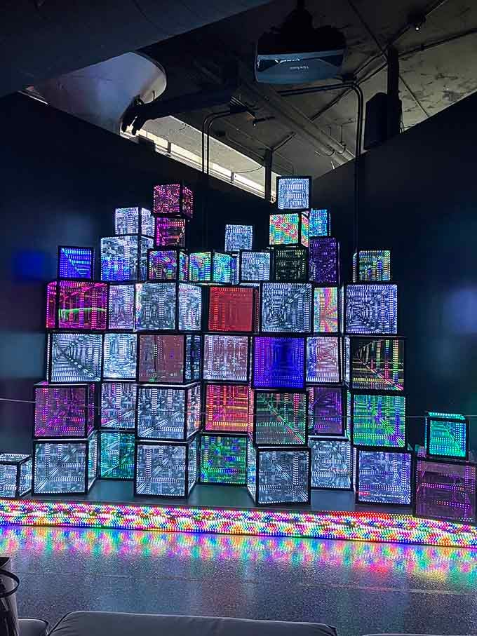 Illuminated cubes stack into infinity, creating a glowing Tetris game that you can walk around but definitely can't win.