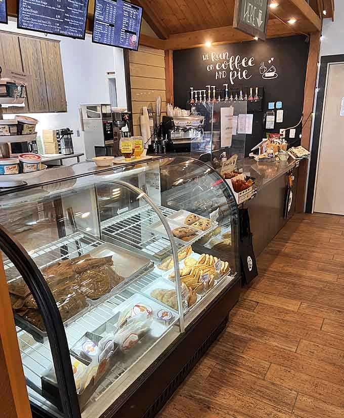 Behind that counter, magic happens daily as pies emerge from ovens like delicious little miracles.