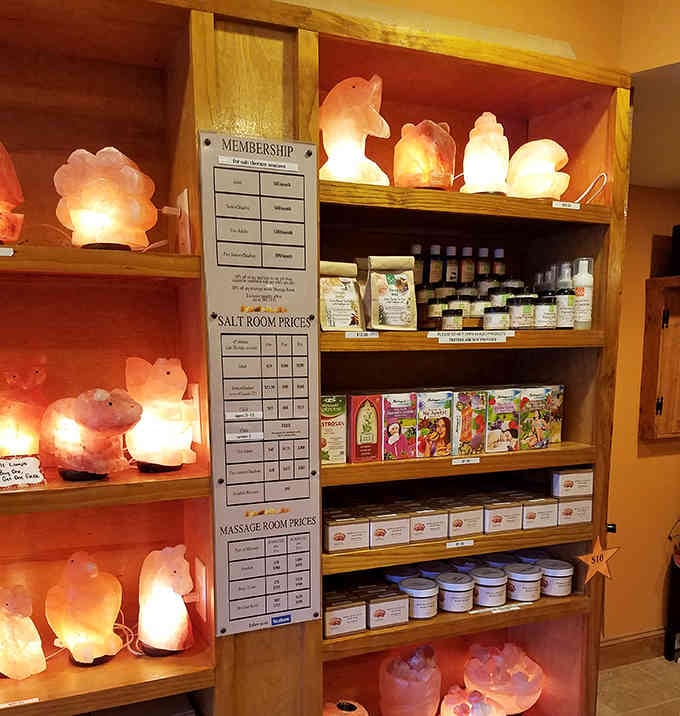 Adorable animal-shaped salt lamps share shelf space with wellness products, making healthy living look absolutely charming and approachable.