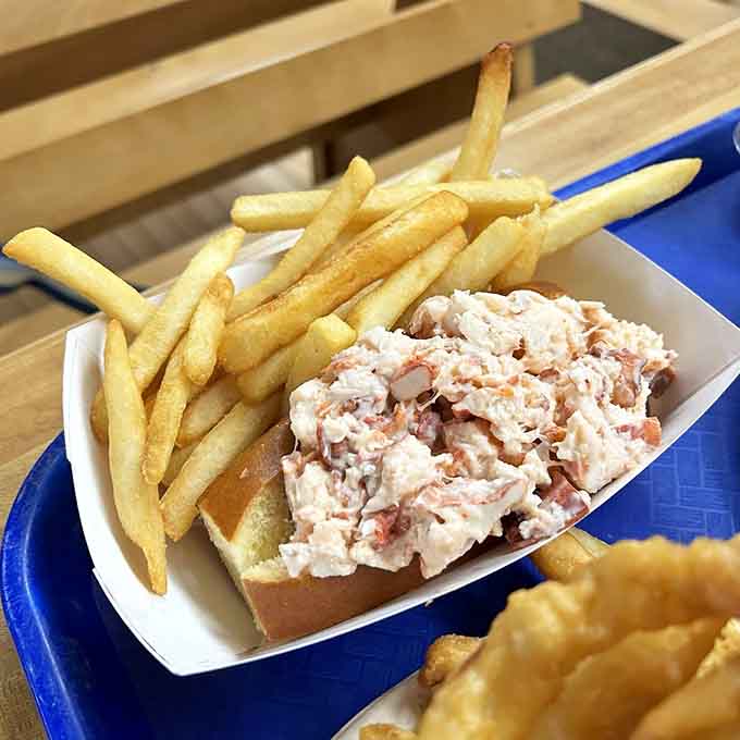 Chunks of sweet lobster meat nestled in a toasted bun, proving less is absolutely more.