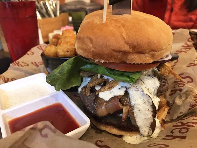 Two patties, jalapeños, and enough toppings to require architectural support, this burger means serious delicious business.