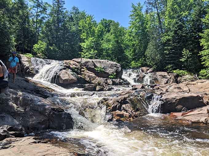 Water dancing over ancient rocks like it's been doing this routine for a few thousand years now.