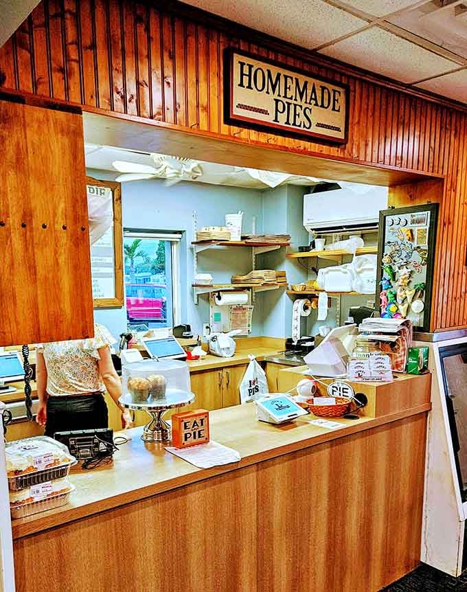 The pie counter beckons like a siren song, displaying fresh-baked temptations that make willpower seem like a silly concept.
