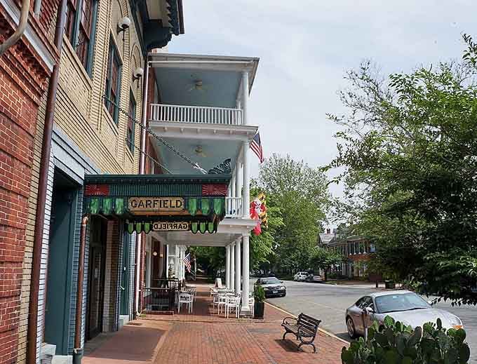 Those ornate balconies and vintage awnings whisper stories of merchants who knew every customer's name.
