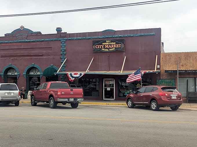 That vintage storefront with patriotic bunting looks like it stepped out of a Norman Rockwell painting, but the barbecue's pure Texas.