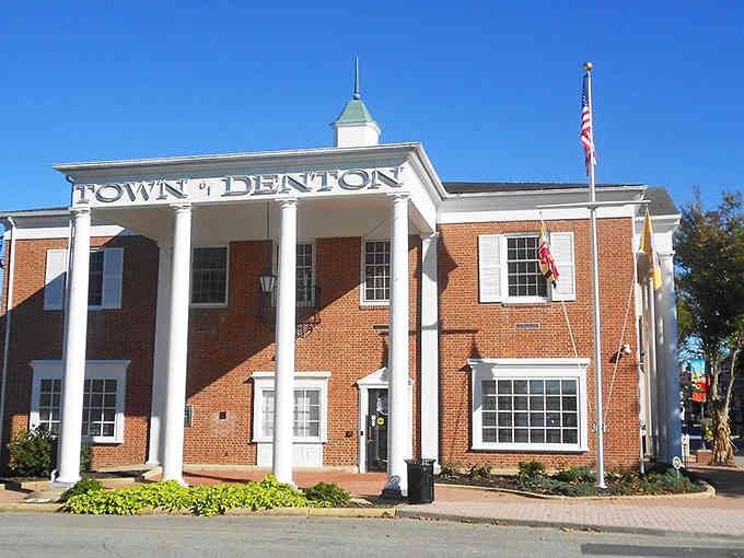 Denton's Town Hall commands attention with those grand white columns, looking like something from a classic Southern courthouse movie.
