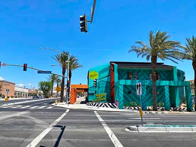That turquoise building pops like a jewel against desert skies in this revitalized downtown corner.