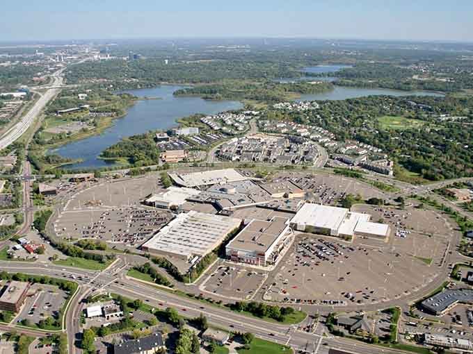 The bird's-eye view reveals how thoughtfully green space wraps around development like nature giving the city a hug.