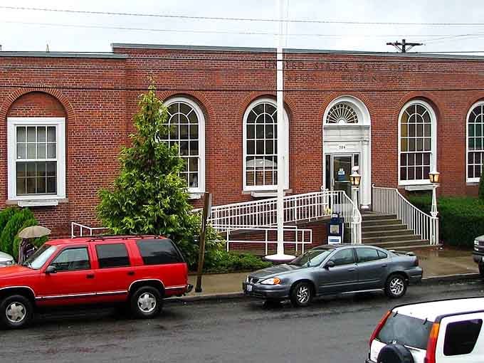 Classic white-trimmed windows and brick construction give this building the kind of timeless appeal that never goes out of style.