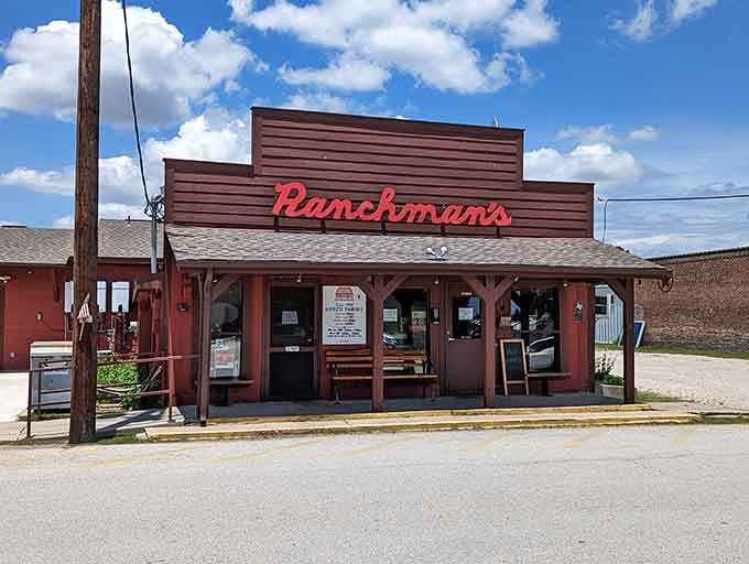 That rustic red storefront looks like it's been feeding hungry folks since John Wayne was still making westerns on horseback.