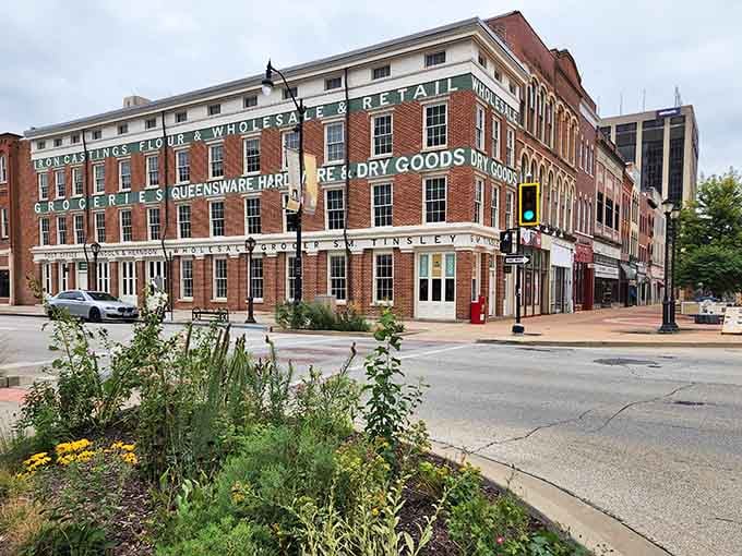 Historic commercial buildings wearing their vintage lettering like badges of honor, beautifully preserved and still working hard.