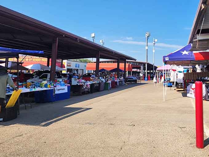 Blue skies frame covered vendor areas where Texas flags flutter proudly above tables loaded with deals that honor your wallet's independence.