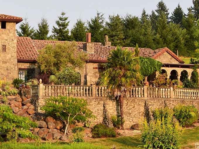Stone walls and terracotta roofs nestle into the hillside like a Tuscan villa that somehow wandered north and decided to stay.