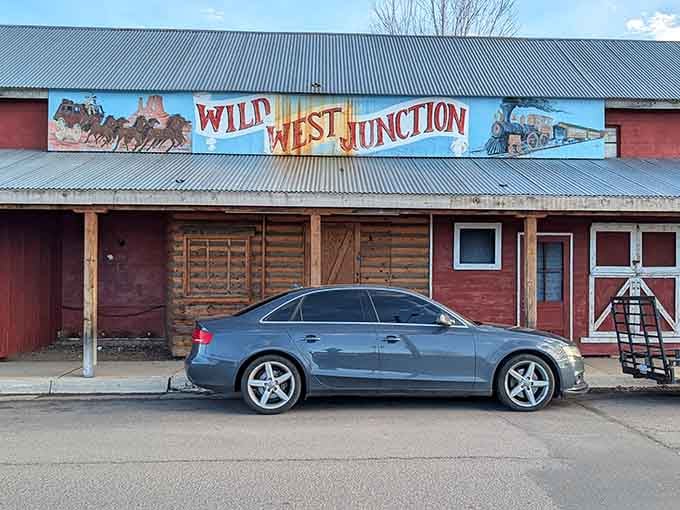 Rustic barn wood and Wild West murals promise frontier adventures before you even taste the food.