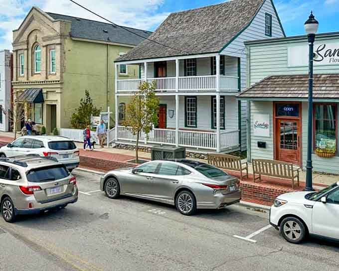 Historic buildings with porches overlooking brick sidewalks capture that timeless European port town character beautifully.