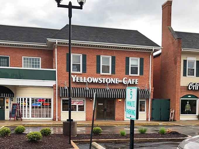 The Yellowstone Cafe storefront sits ready to welcome diners with that classic awning and hometown appeal.