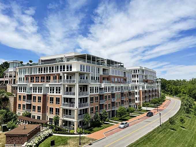Modern residential buildings nestle into the greenery, proving retirement living can mean comfort without sacrificing style or natural beauty.