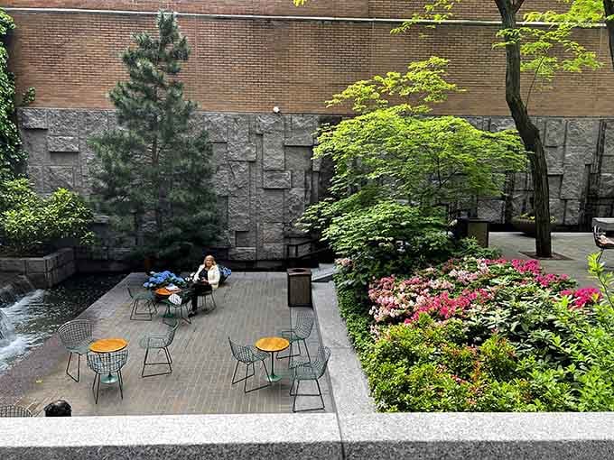 Vibrant flowers and modern seating create this pocket paradise where stressed New Yorkers rediscover their peaceful center.