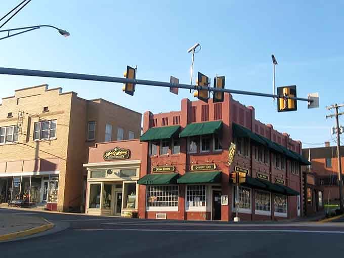 Those traffic lights hanging over brick buildings remind you that progress and preservation can coexist peacefully together.