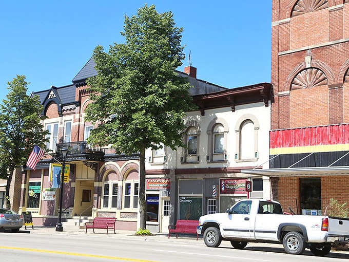 Leafy trees shade a downtown where Victorian-era buildings stand shoulder-to-shoulder like old friends catching up.