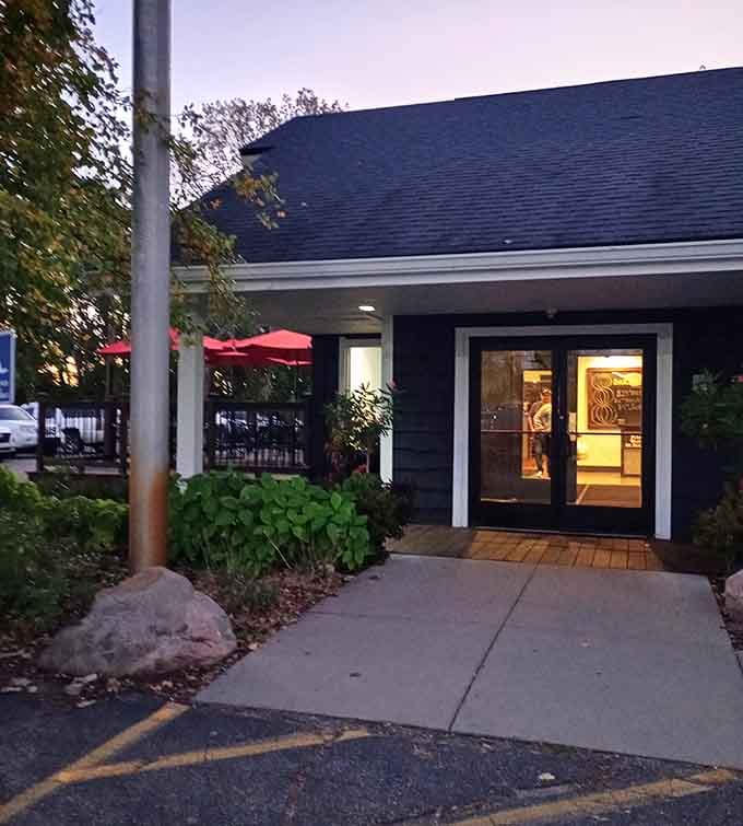 As twilight falls, warm light spills from the windows, beckoning diners to discover what makes this spot special.