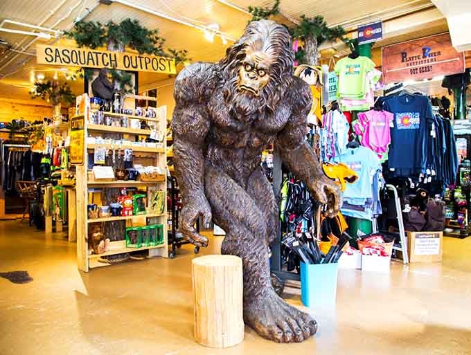 The legendary creature himself greets visitors inside, his impressive form towering over merchandise in this Bigfoot believer's paradise.