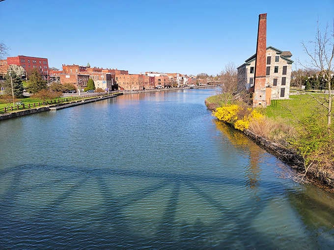The canal reflects buildings like a mirror, doubling the beauty and historic charm of this remarkable place.