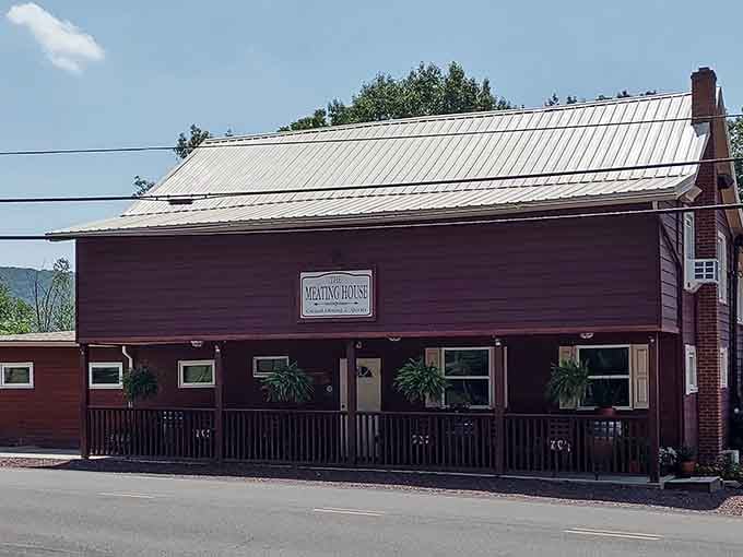 The brown wood siding gives this spot a rustic, honest feel that matches the straightforward menu inside perfectly.